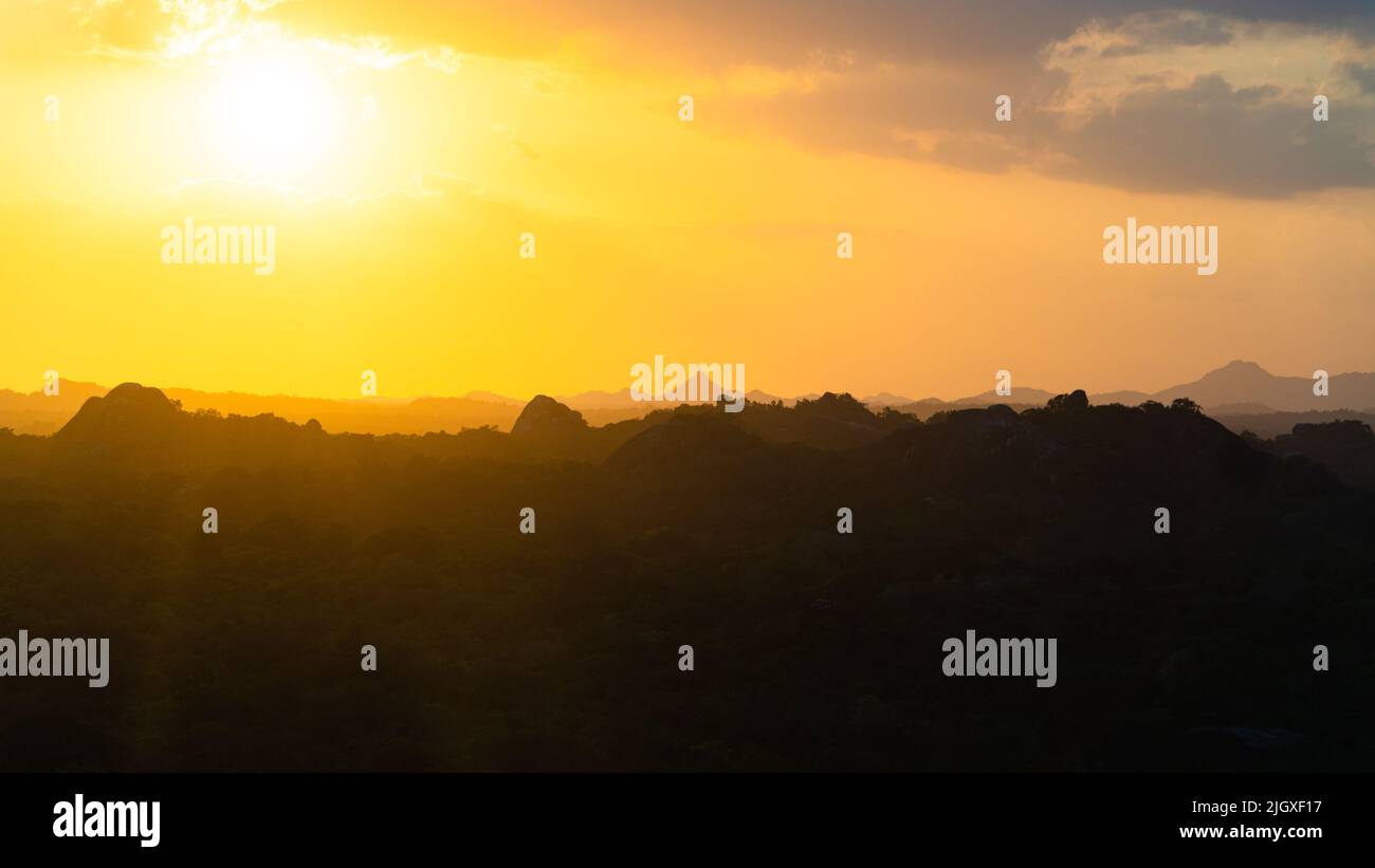 Colorful sunset over jungle and rainforest. Sri Lanka Stock Photo - Alamy