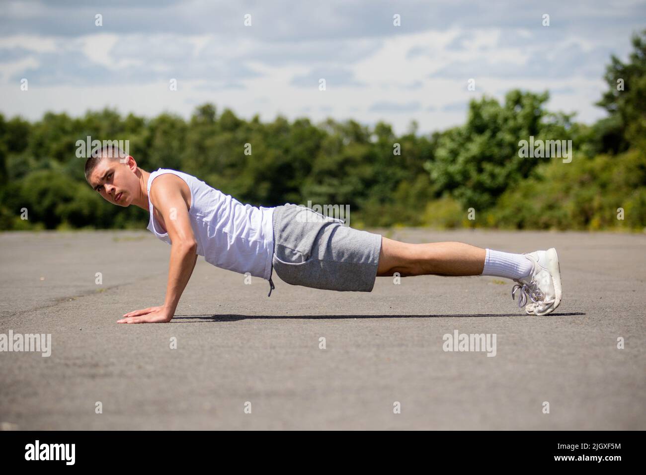A Nineteen Year Old Teenage Boy Doing Push Ups A Public Park Stock ...