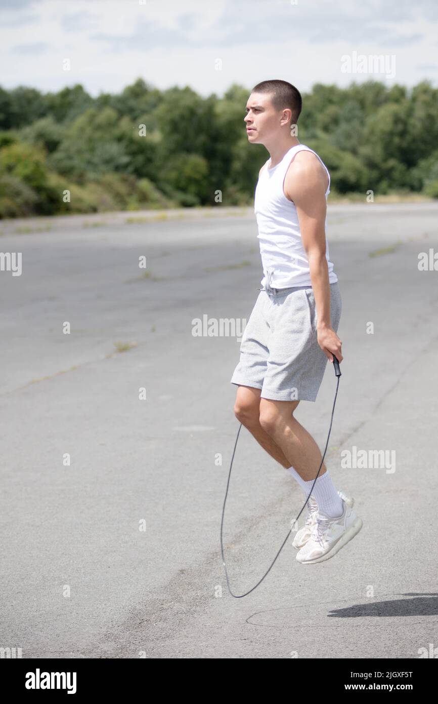 Boy skipping rope hi-res stock photography and images - Alamy