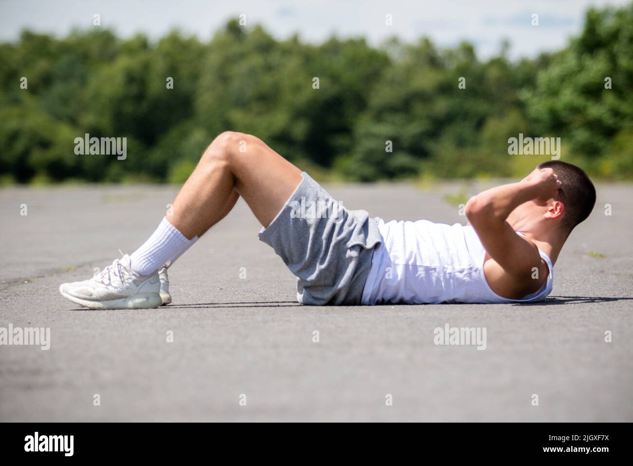 Boy sit ups hi-res stock photography and images - Alamy