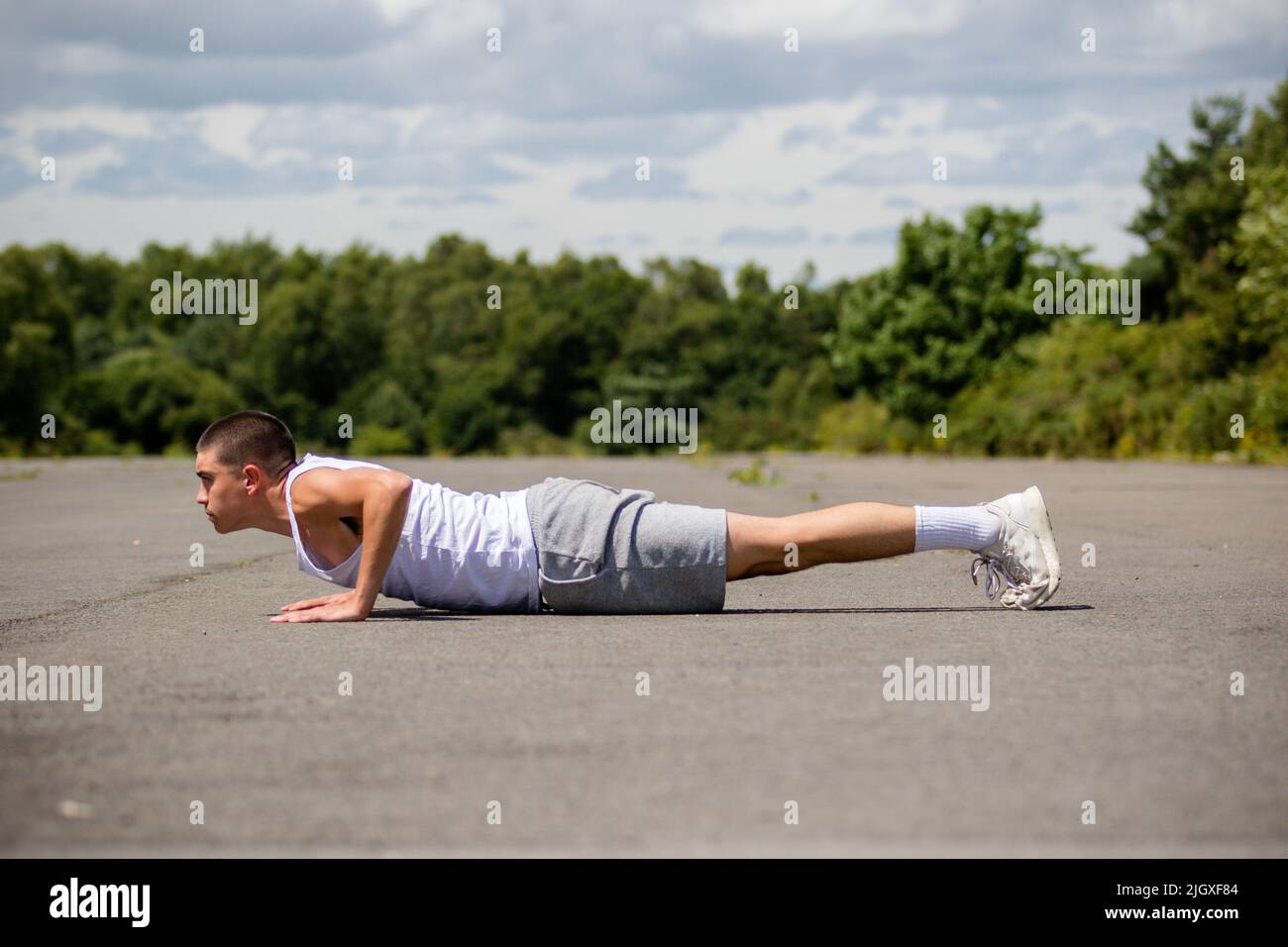 A Nineteen Year Old Teenage Boy Doing Push Ups A Public Park Stock ...