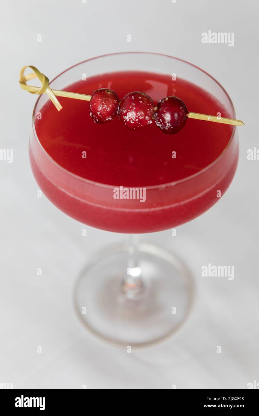 Close-up of fall cranberry cocktail with white background Stock Photo ...