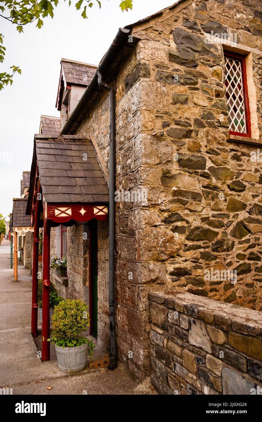 Tree branch columns and carved bargeboards in Virginia, Ireland Stock ...