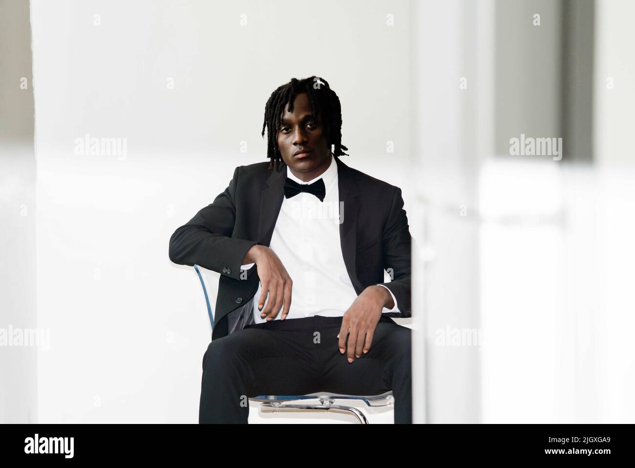 Portrait businessman dreadlocks wearing suit hi-res stock photography ...