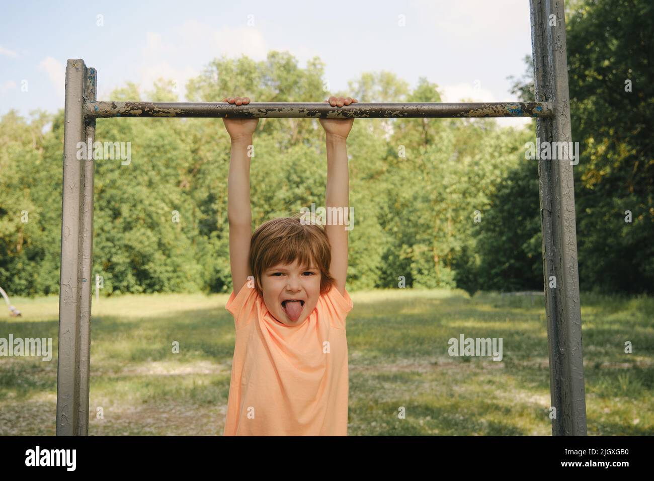 Kid playing outdoors, sport summer day activity Stock Photo - Alamy