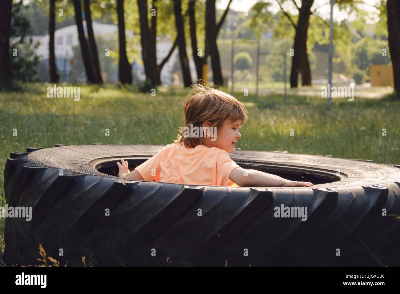 Kid playing outdoors, sport summer day activity Stock Photo - Alamy