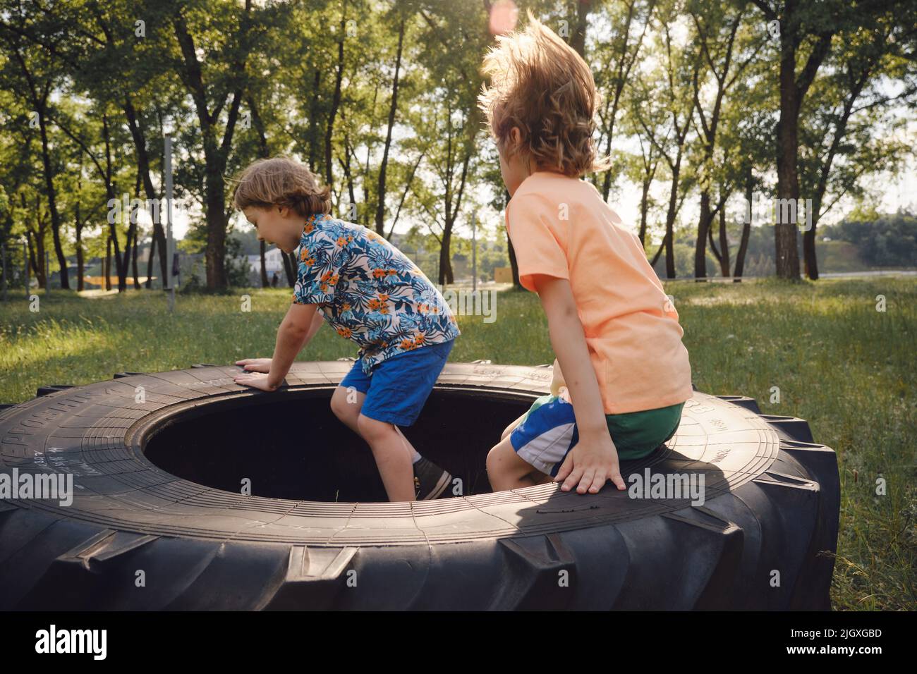 Kids playing outdoors, sport summer day activity Stock Photo - Alamy