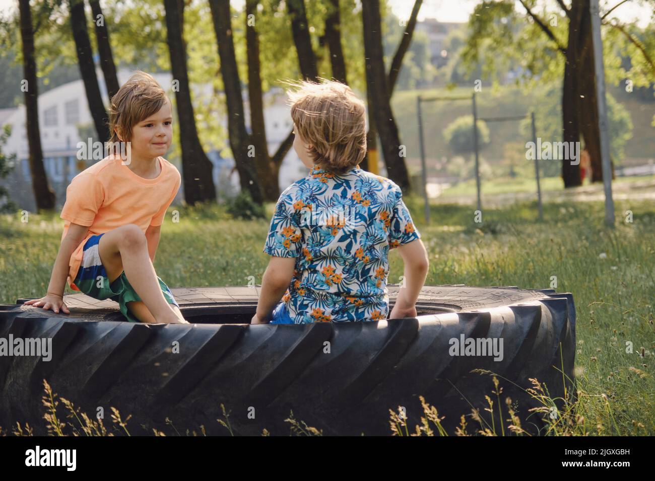 Kids playing outdoors, sport summer day activity Stock Photo - Alamy