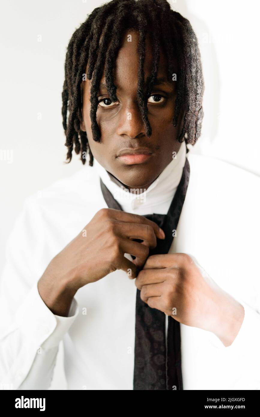 African business man fixing his tie hi-res stock photography and images ...