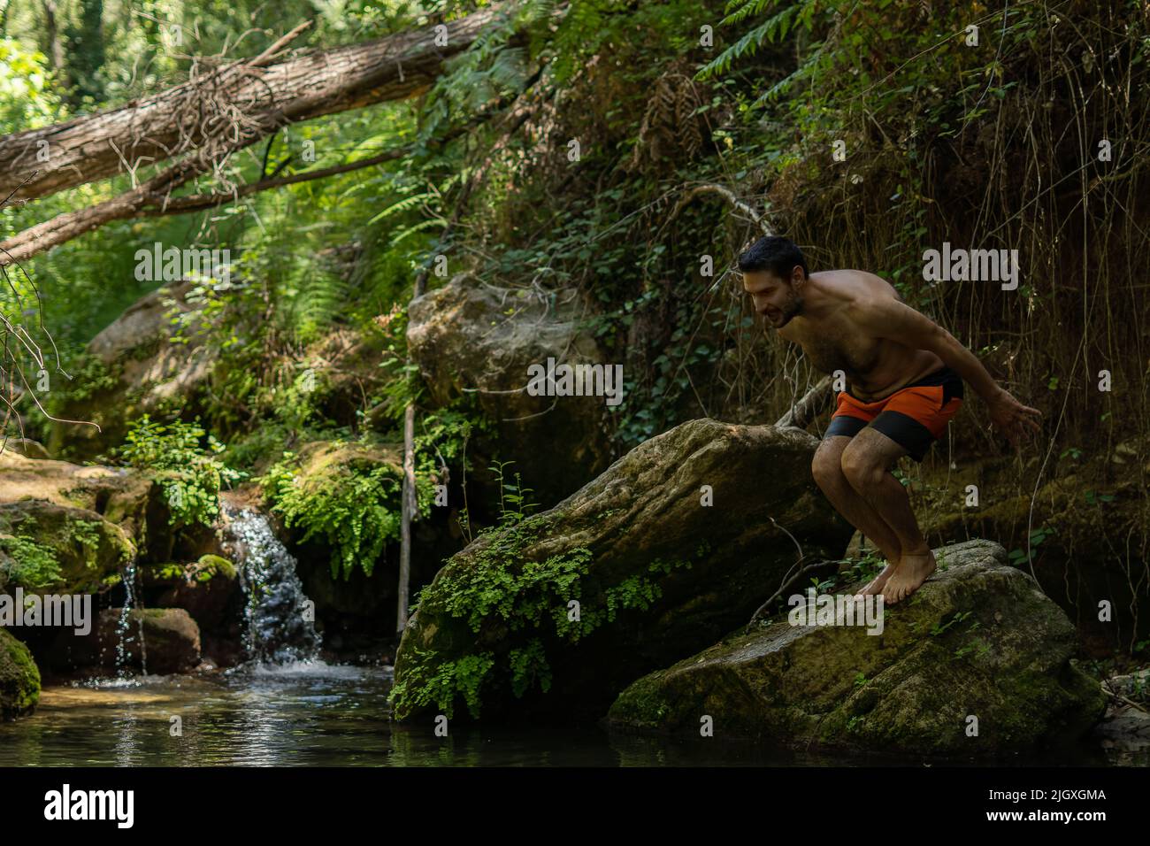 Jump into mid air young man hi-res stock photography and images - Alamy