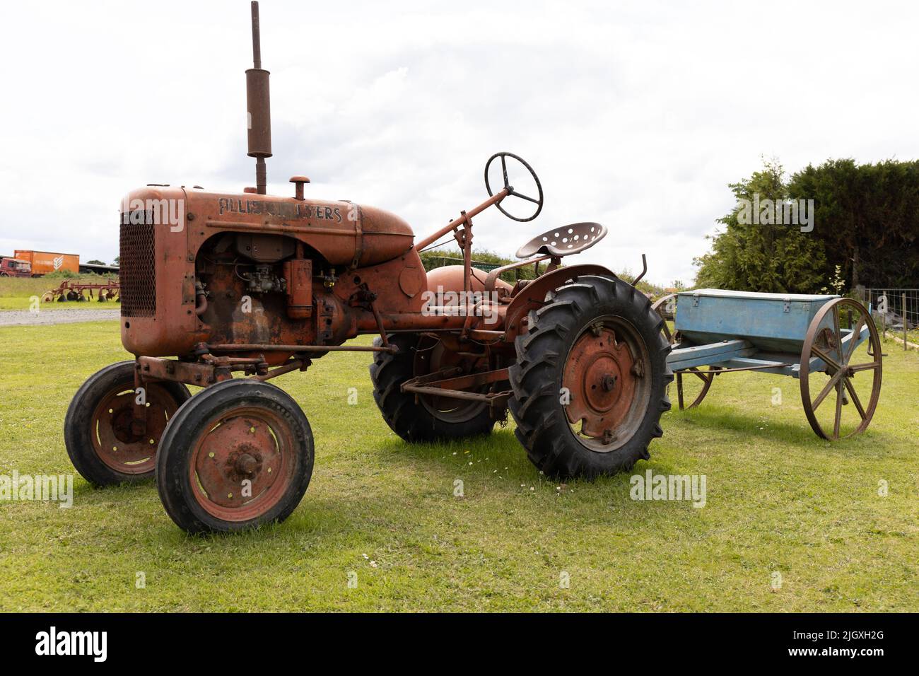 Allis Chalmers unrestored classic tractor with trailer Stock Photo - Alamy