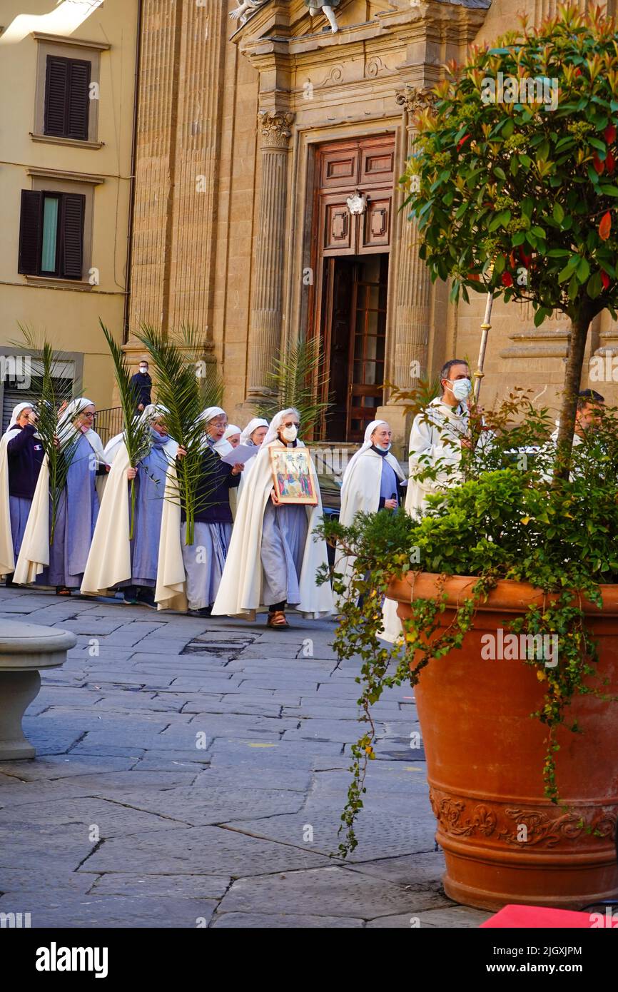 Palm Sunday procession during Lent with priests, nuns, and other robed ...