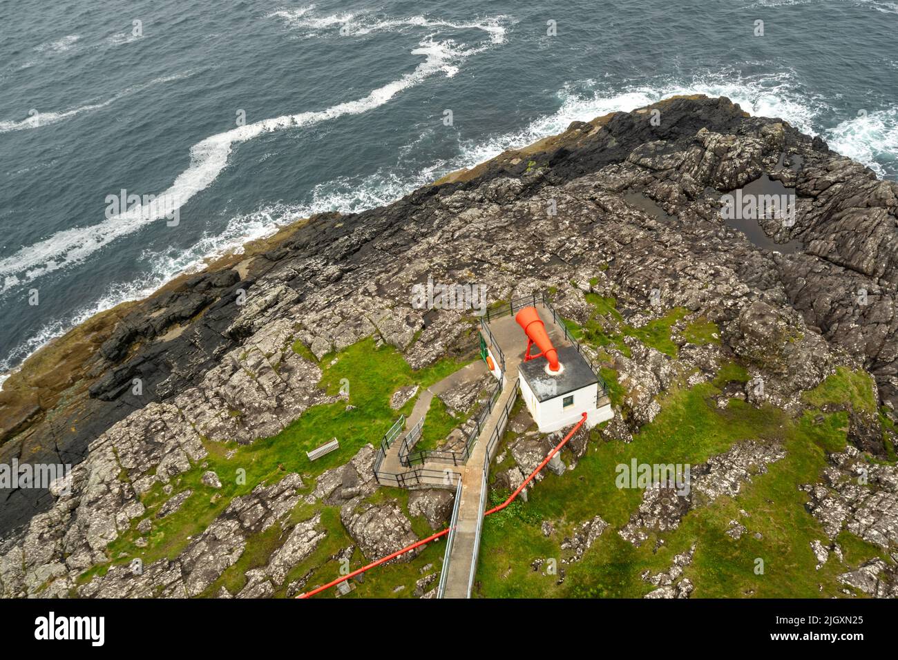 View from the top of Ardnamurchan Lighthouse. Disused red foghorn and ...