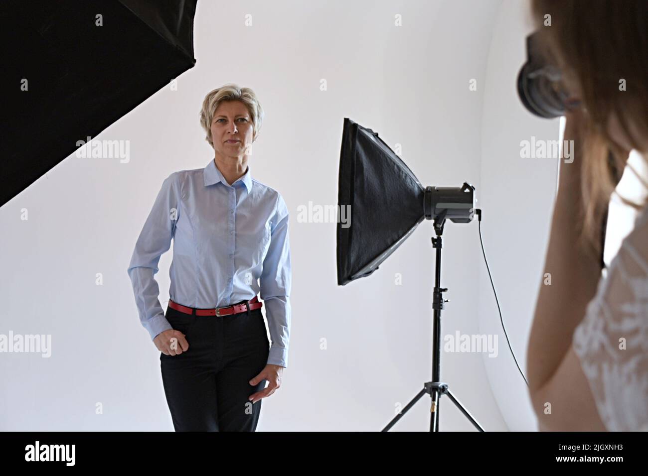 woman in a professional photo studio. Business portrait photography ...