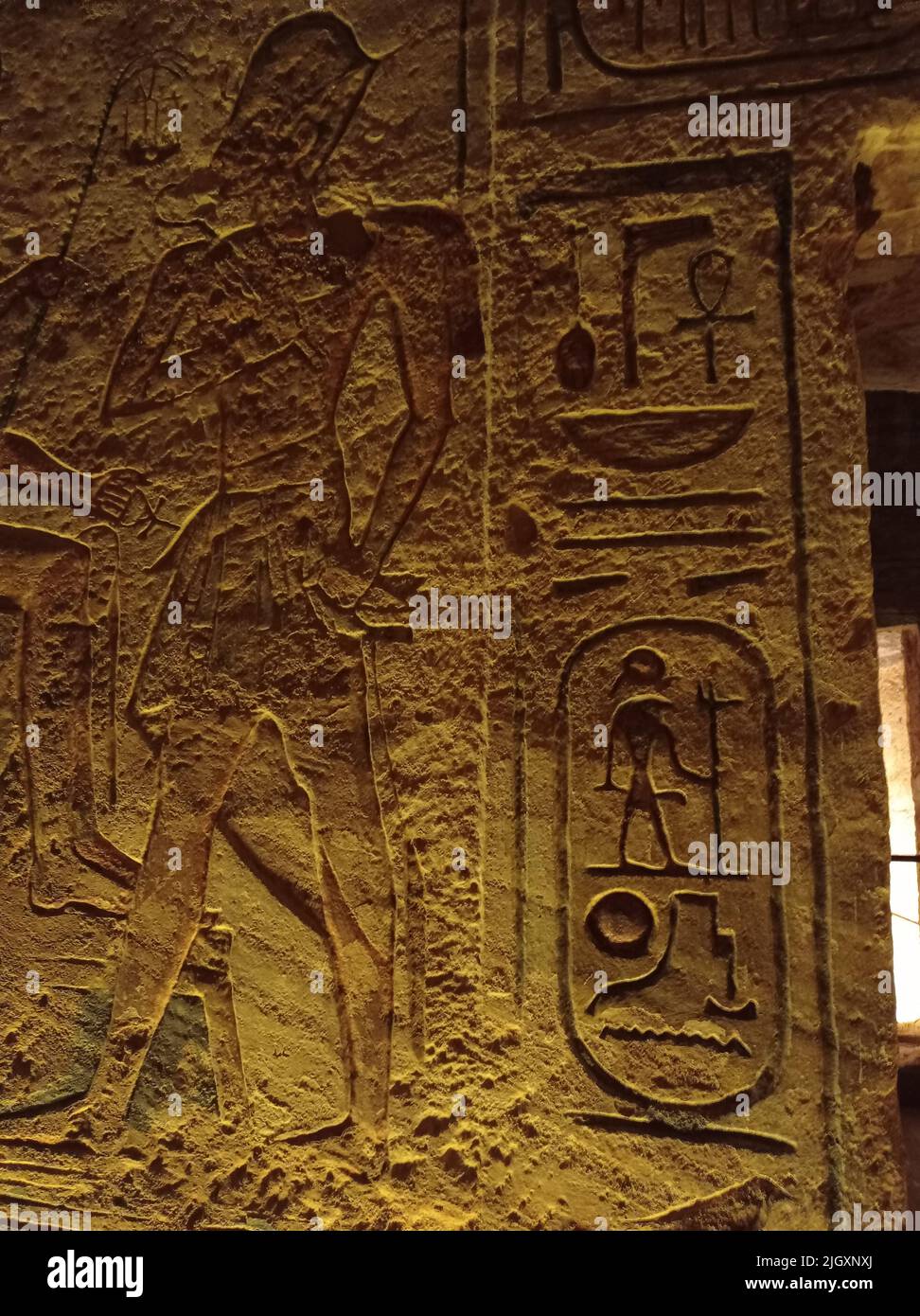 Detail of the hieroglyphs carved on the stone of an ancient wall in ...