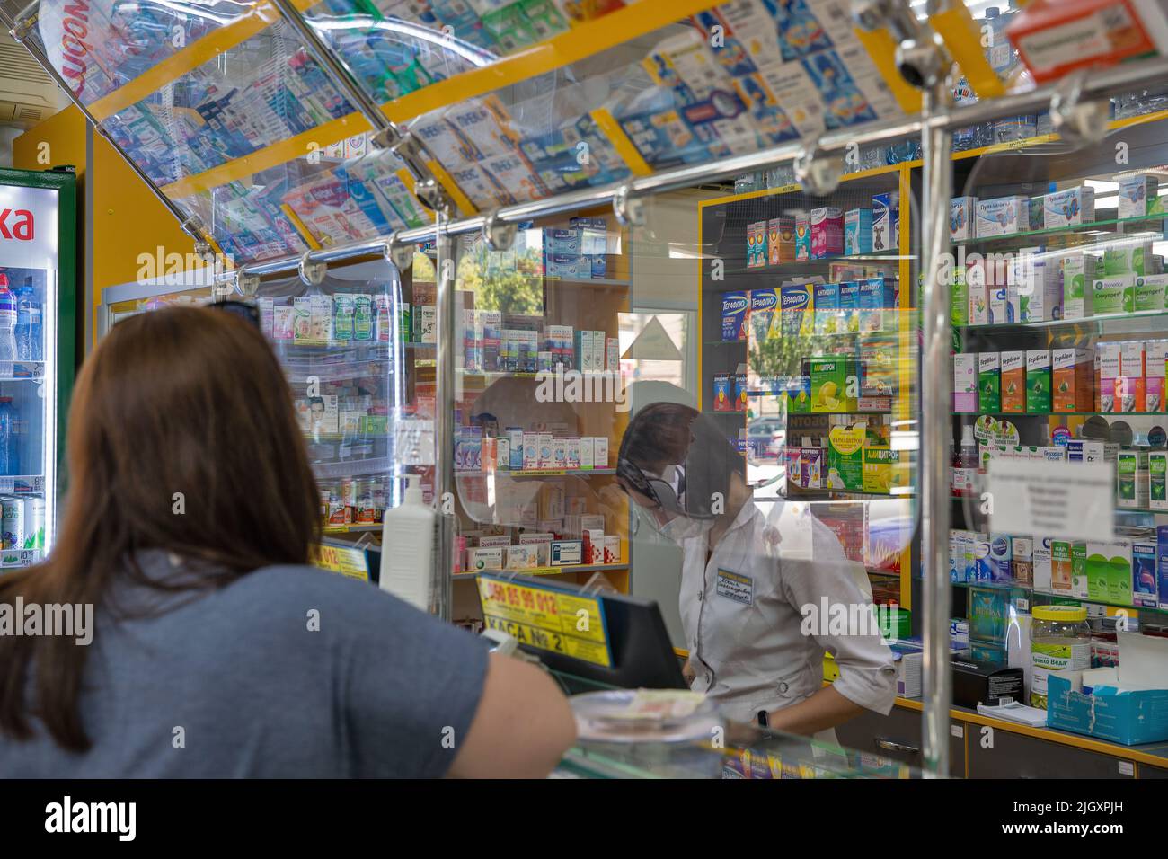 People pharmacy counter window hi-res stock photography and images - Alamy