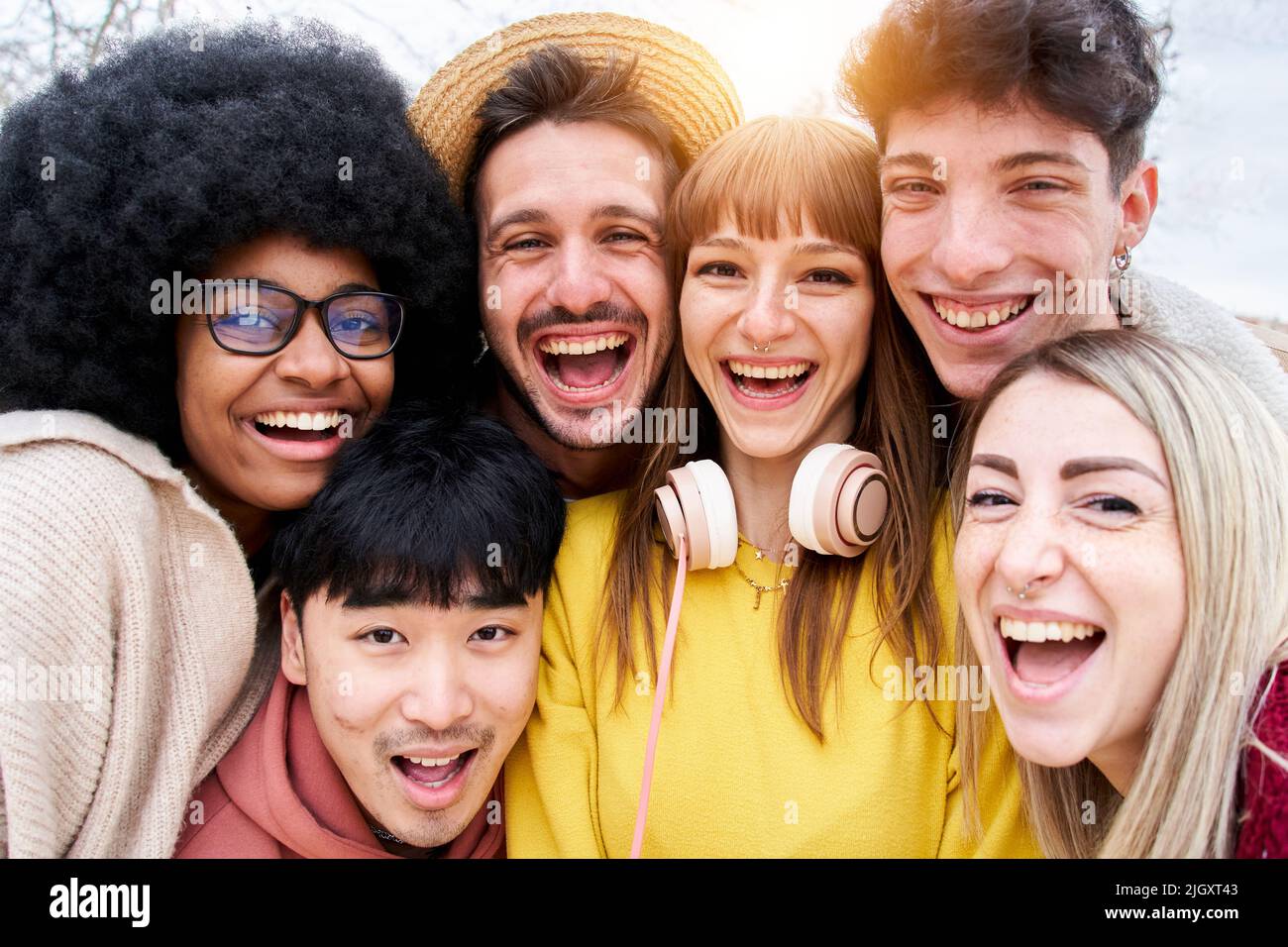 Portrait of Cheerful group of friends taking smiling selfie. Group of ...