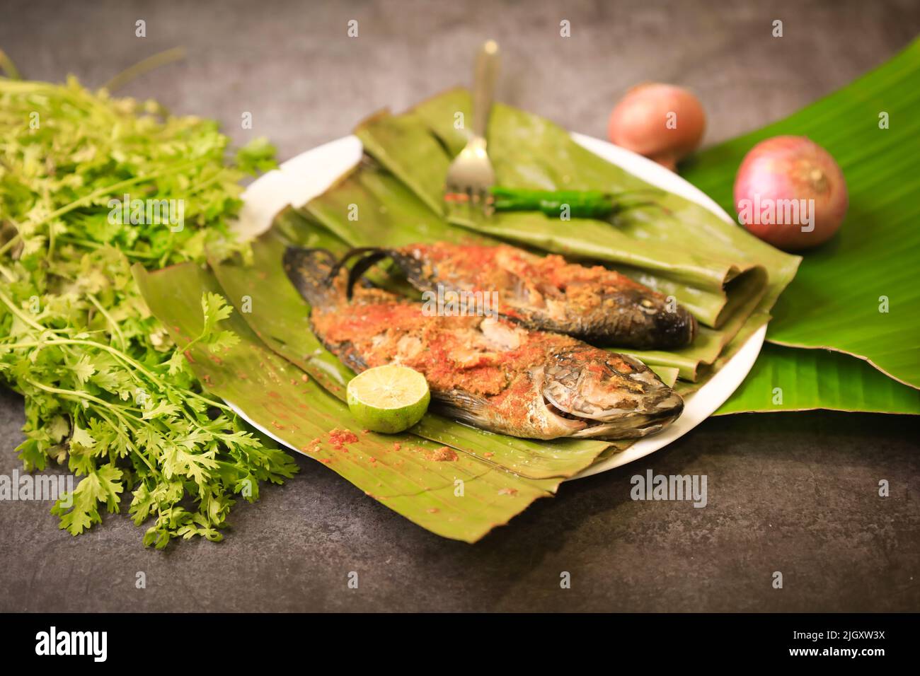 south indian famous steamed fish recipe Stock Photo - Alamy