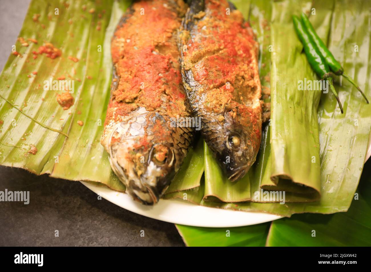 south indian famous steamed fish recipe Stock Photo - Alamy