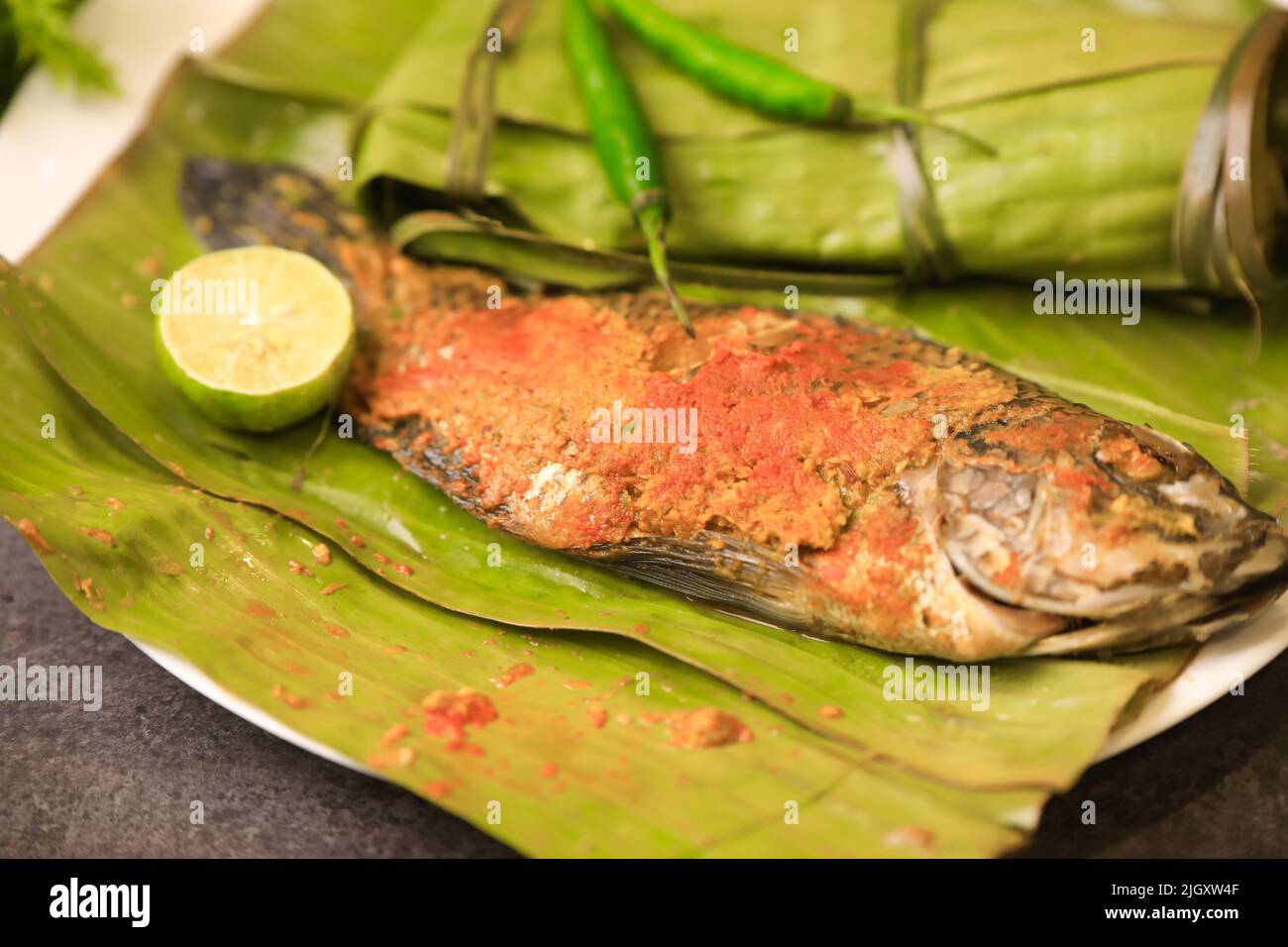 south indian famous steamed fish recipe Stock Photo - Alamy