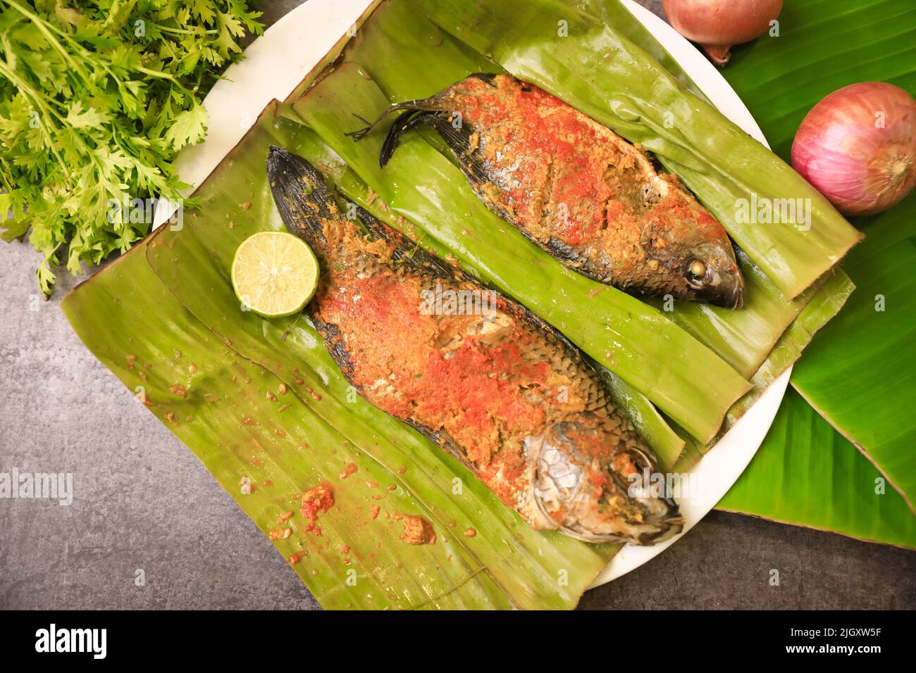 south indian famous steamed fish recipe Stock Photo - Alamy