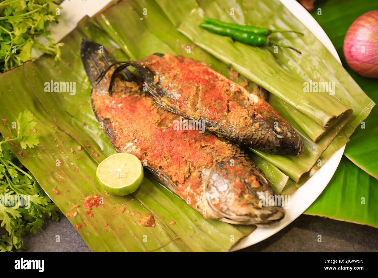 south indian famous steamed fish recipe Stock Photo - Alamy