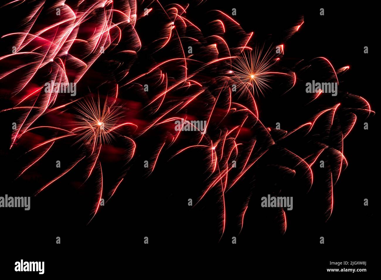 New Year's holiday fireworks. Bright beams of light from explosion of ...