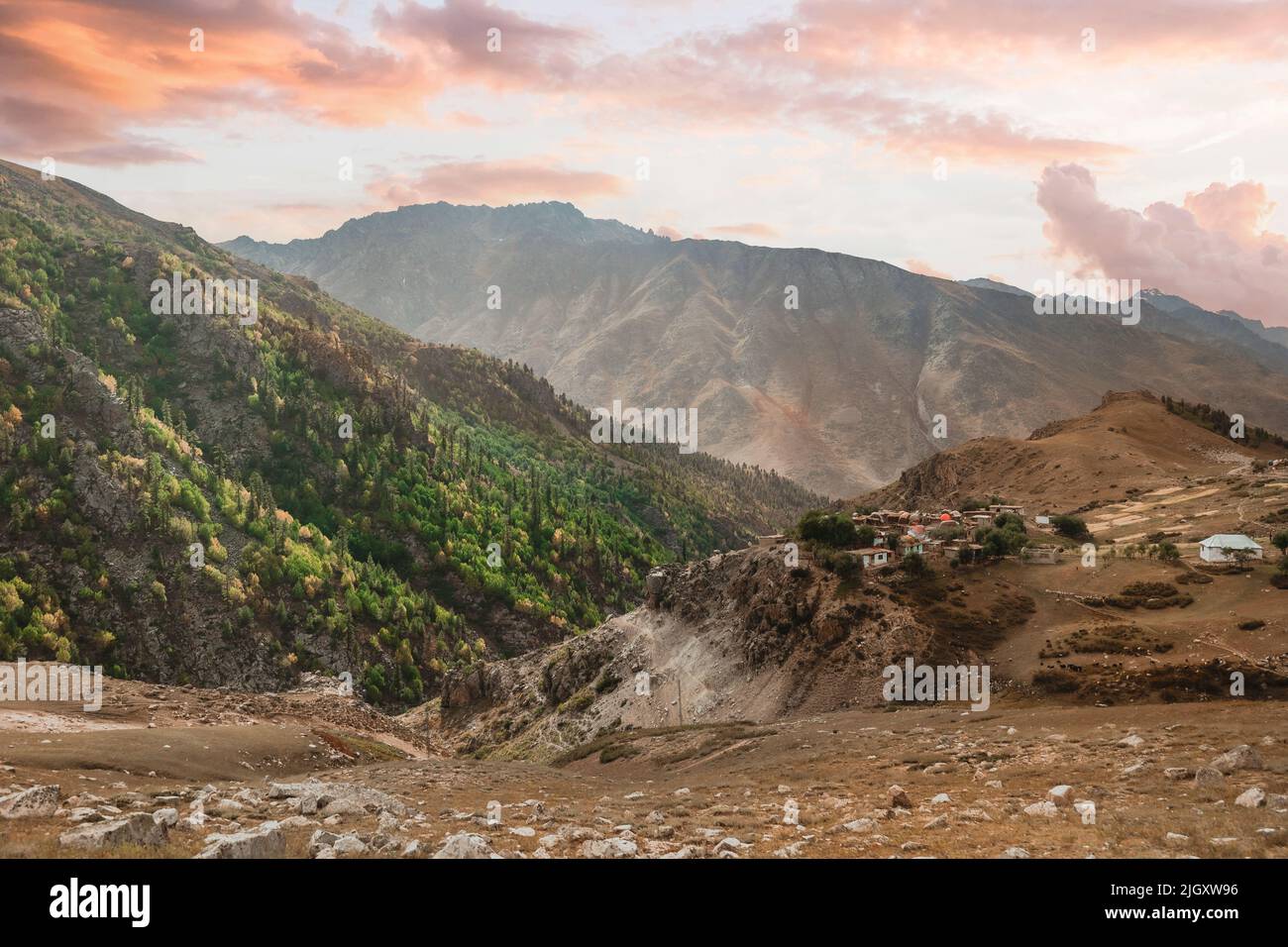 rural mountain village on mountain cliff in Astore Valley Pakistan ...