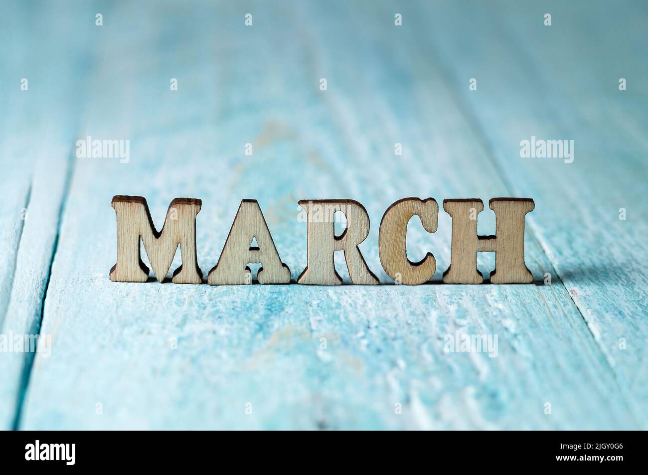 The month of January is large on a blue background. The names of the ...