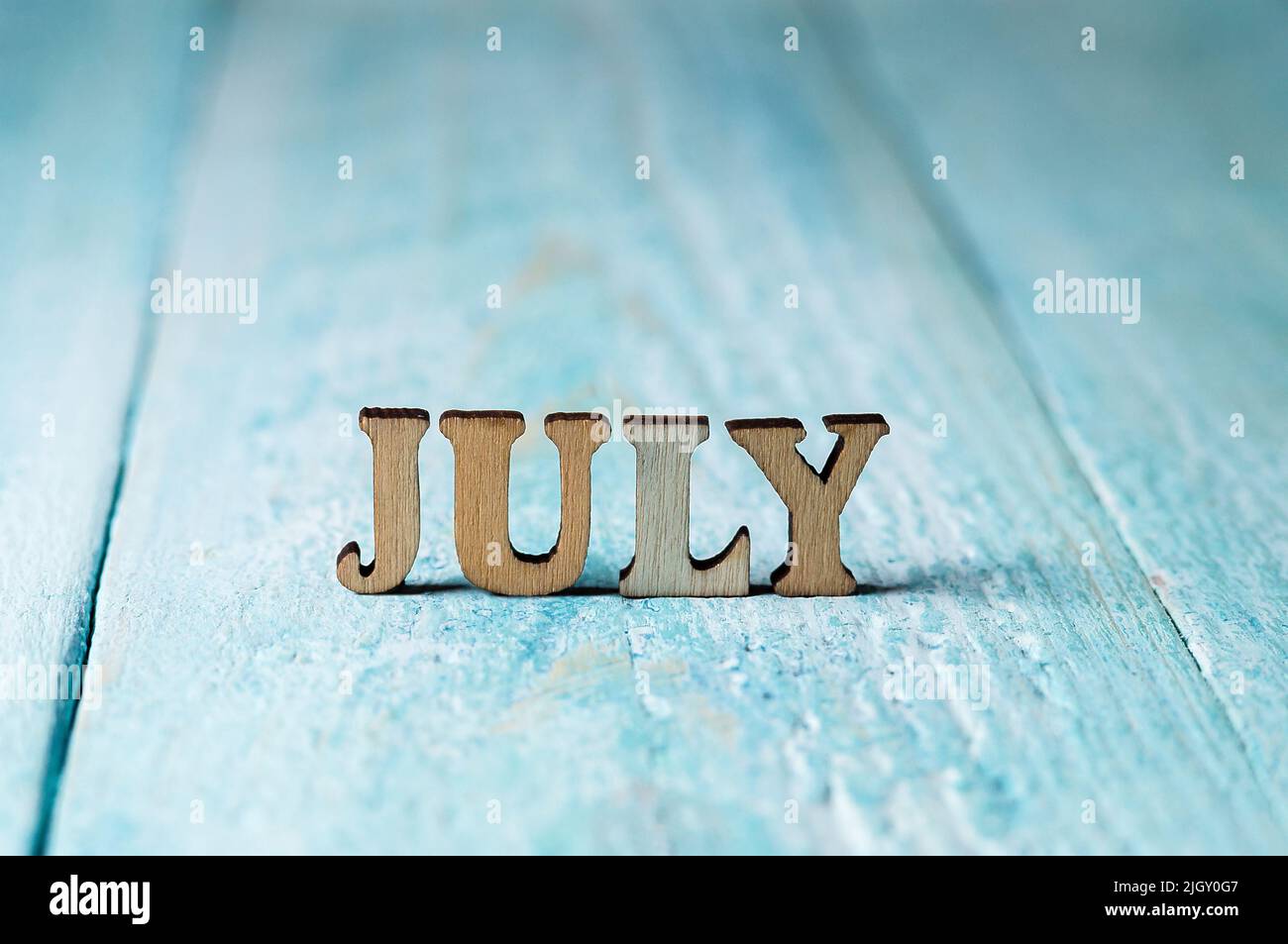 The month of January is large on a blue background. The names of the ...