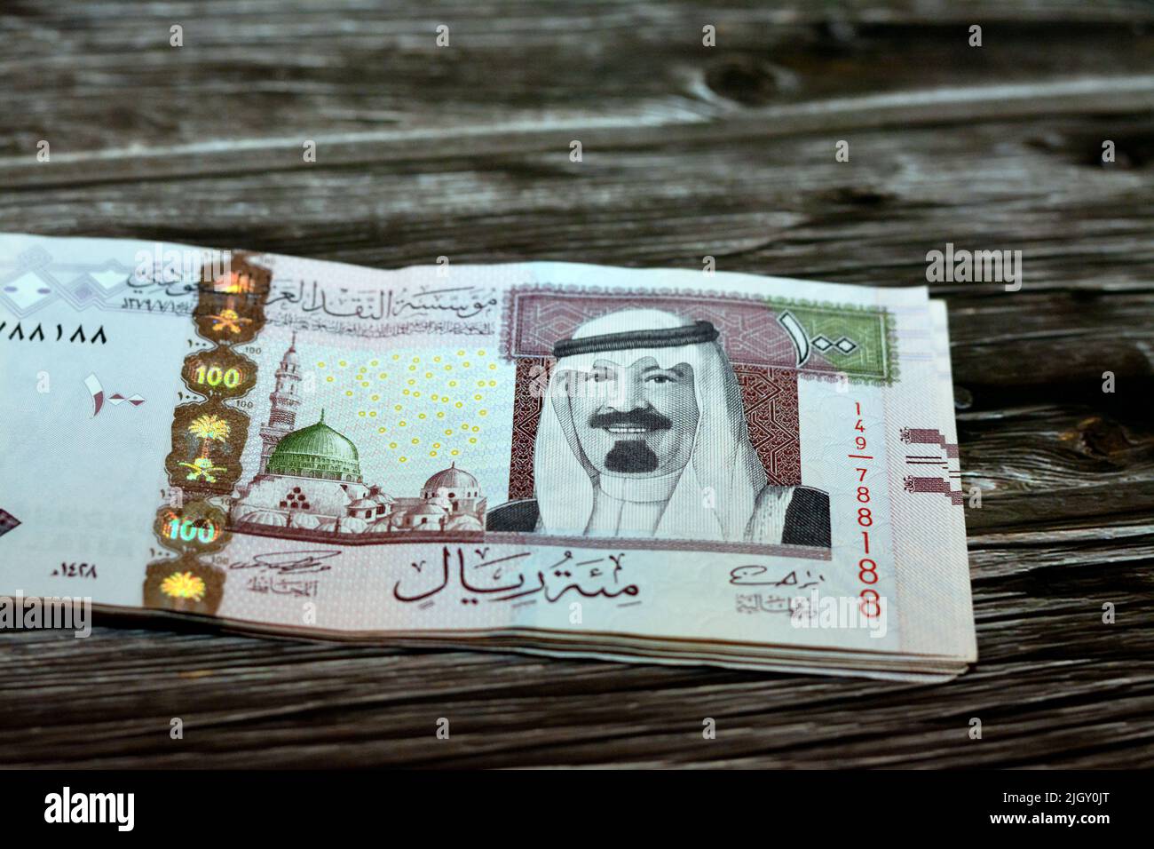 Stack of Saudi Arabia 100 SAR one hundred riyals cash money banknote ...