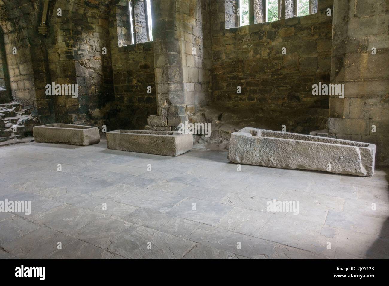 Several sarcophagus inside the Chapter house, Kirkstall Abbey, a ruined ...