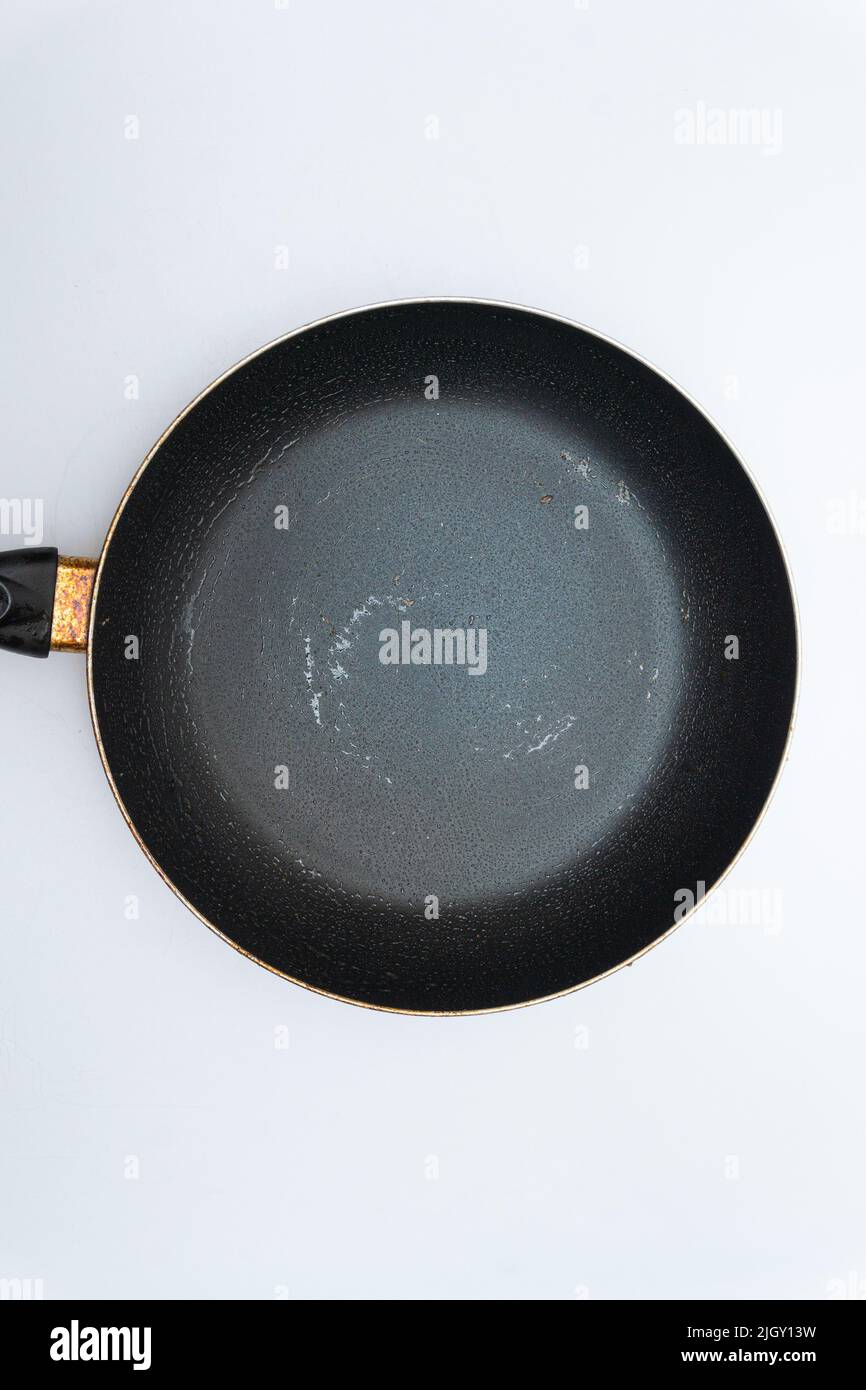 Old frying pan with a lot of grease Stock Photo - Alamy