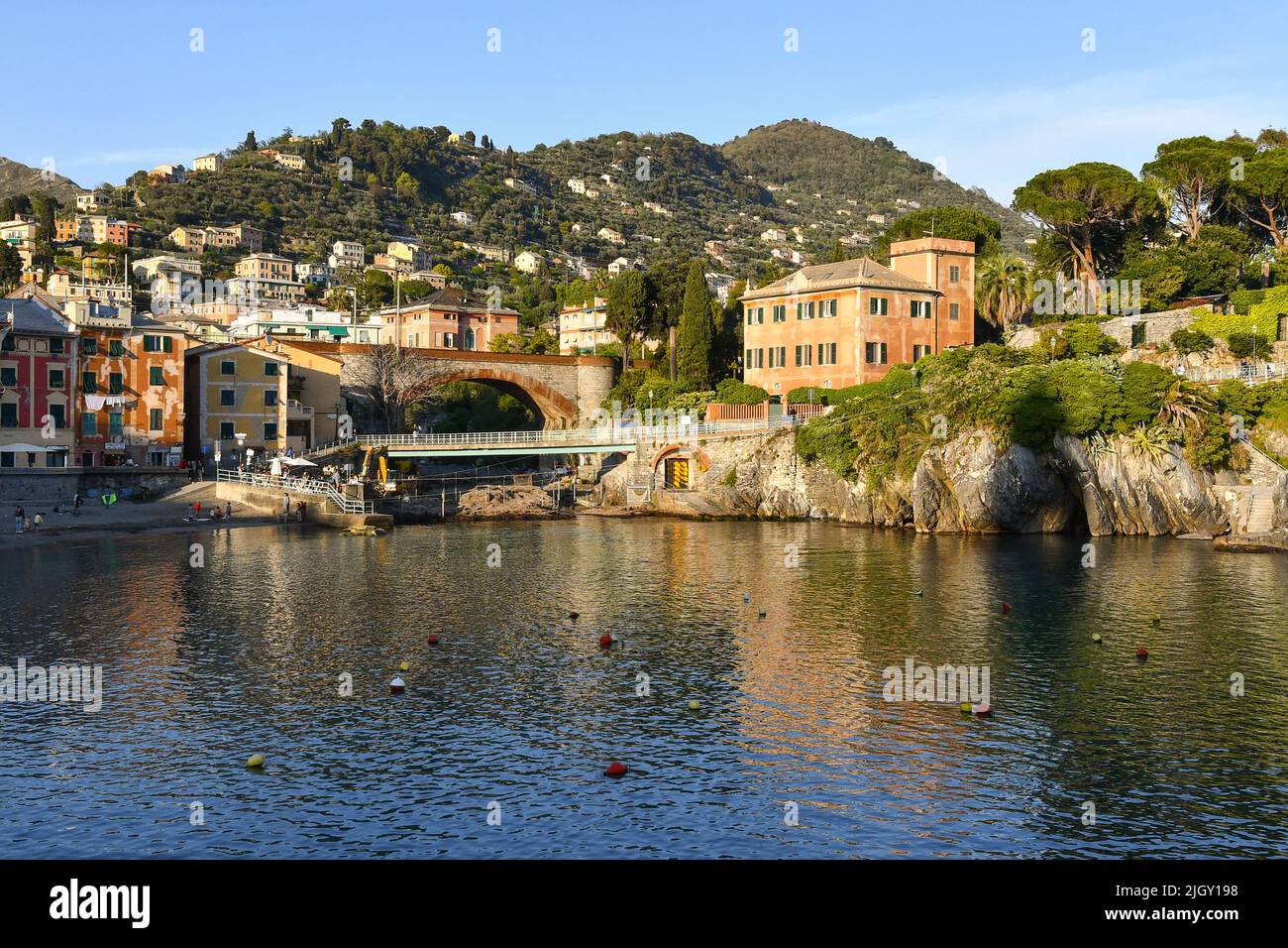View of the old fishing village with the railway arch bridge and the ...