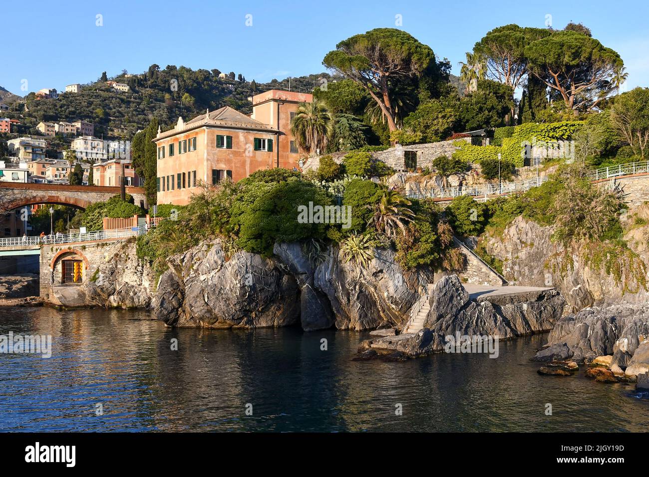 View of the old fishing village with the railway arch bridge and the ...