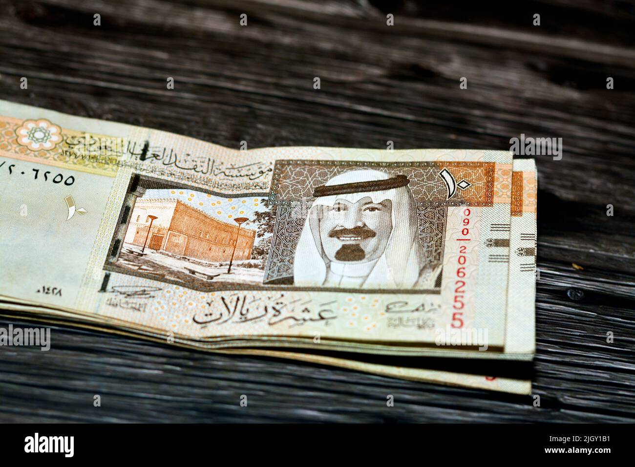 Stack of Saudi Arabia 10 SAR ten Saudi riyals cash money banknote with ...