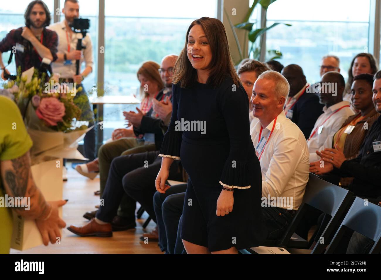 Senior advisor Mark Logan (right) and Finance Secretary Kate Forbes as ...