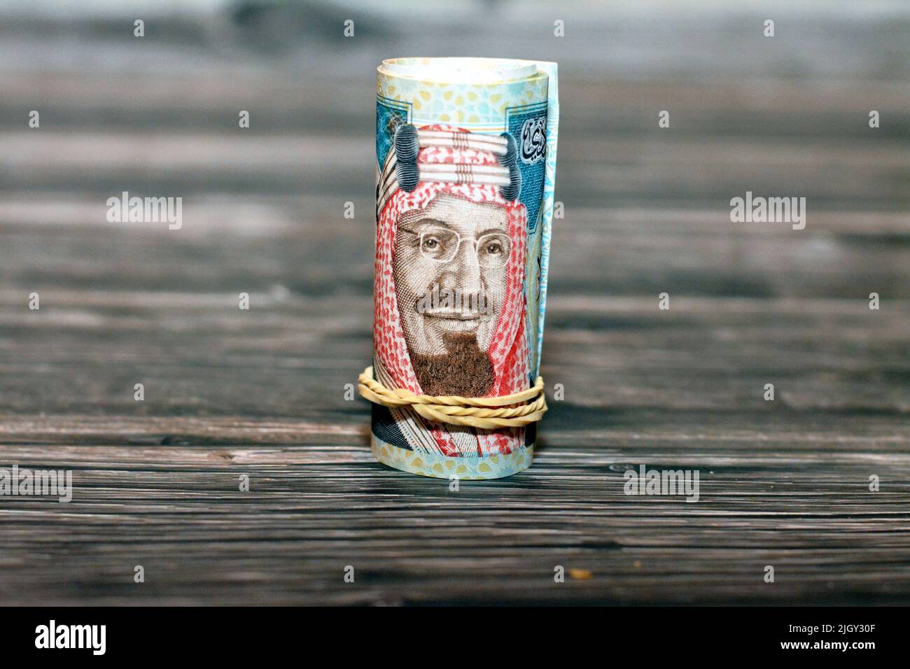 20 SAR twenty Saudi riyals cash money banknote bills rolled up with ...