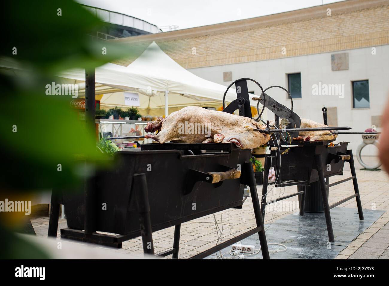 marinated lamb is cooked on a spit Stock Photo - Alamy