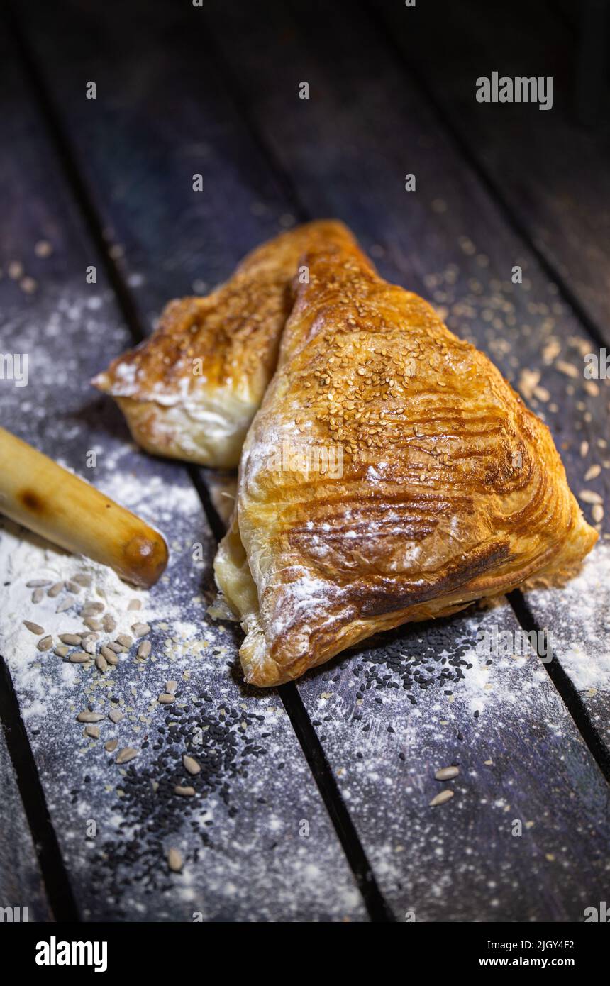 delicious crispy puff pastry samsa close-up top view Stock Photo - Alamy