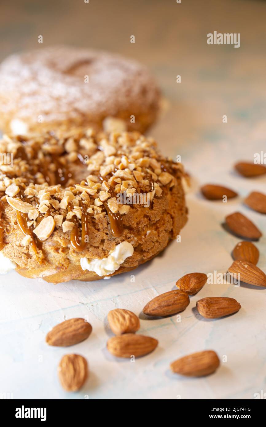 delicious donut with nuts and stuffing top view Stock Photo - Alamy