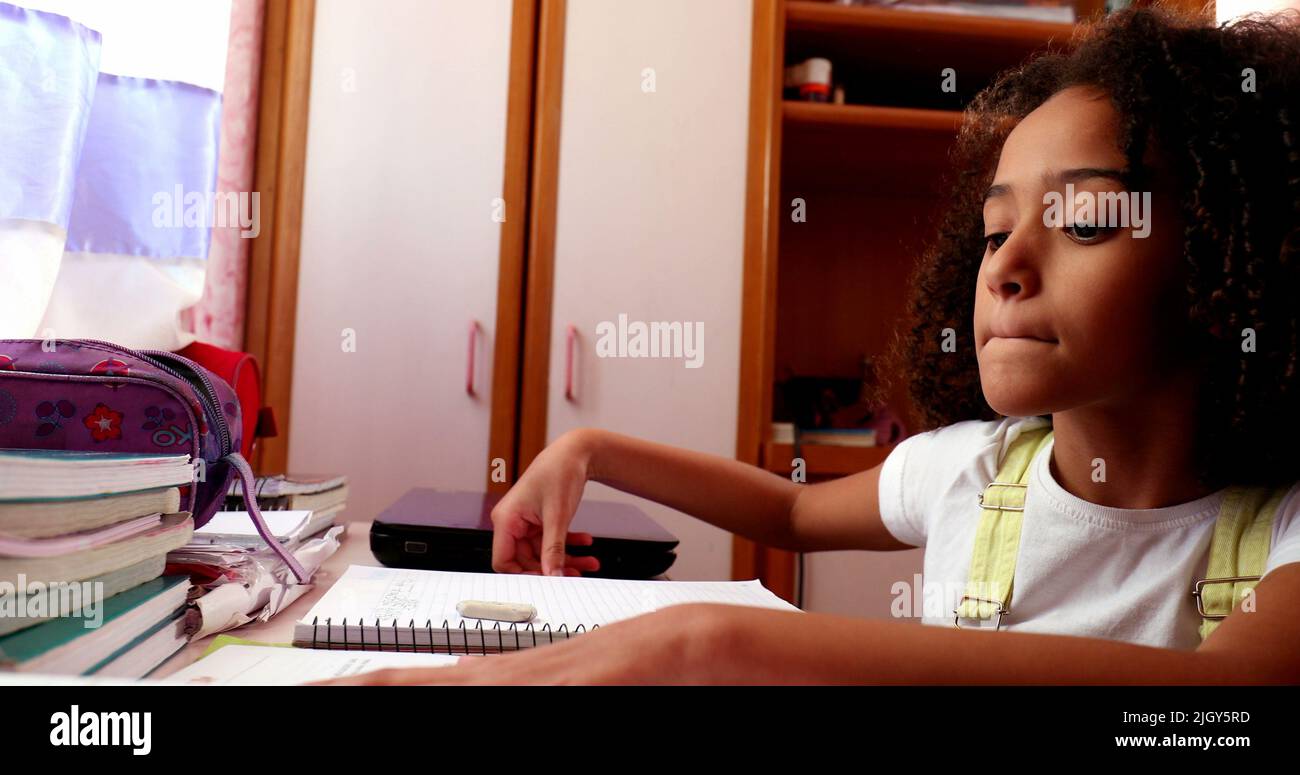 Child studying at home during quarantine Stock Photo - Alamy