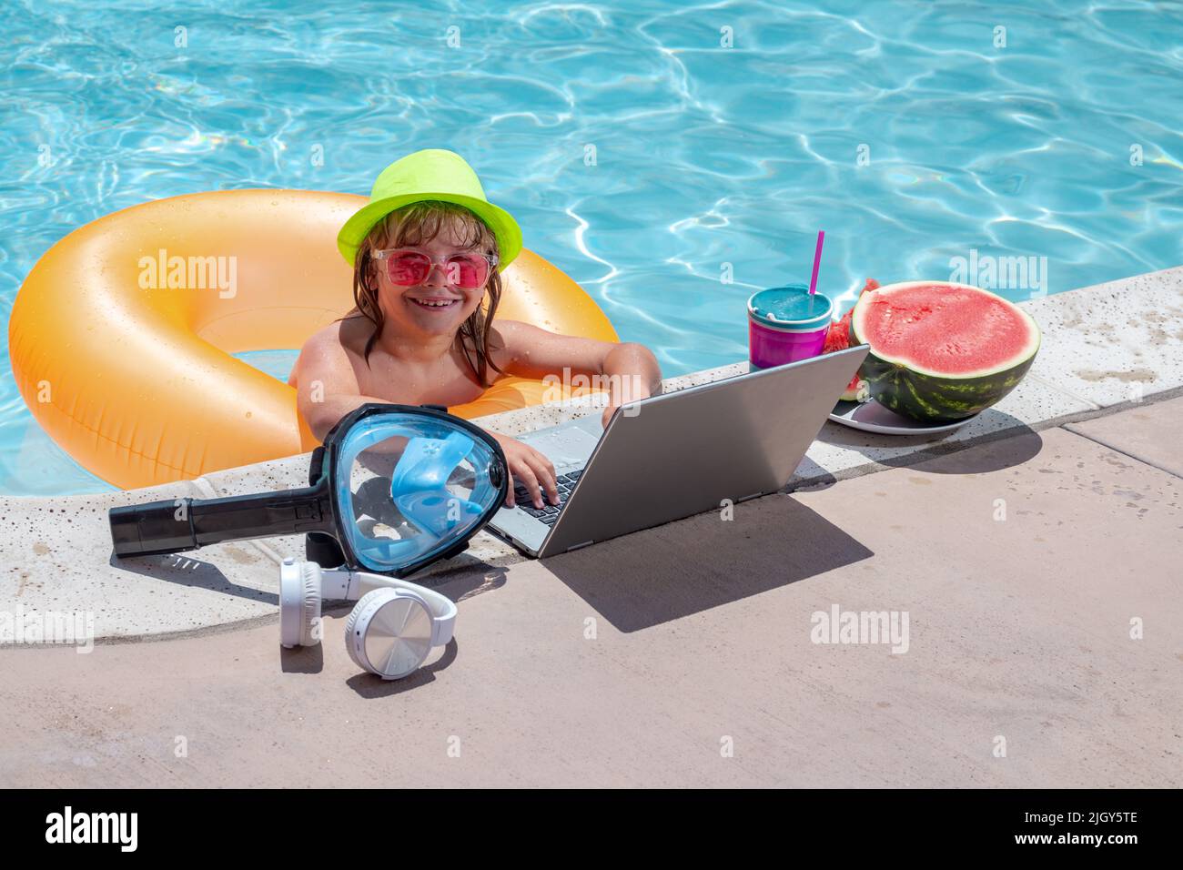 Laptop by the pool hi-res stock photography and images - Alamy