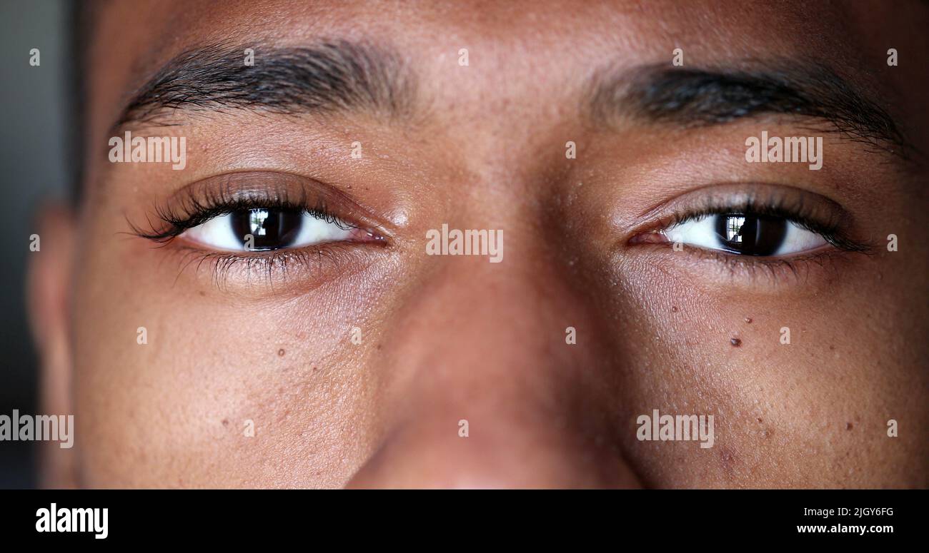 Eyes close-up African black man smiling Stock Photo - Alamy