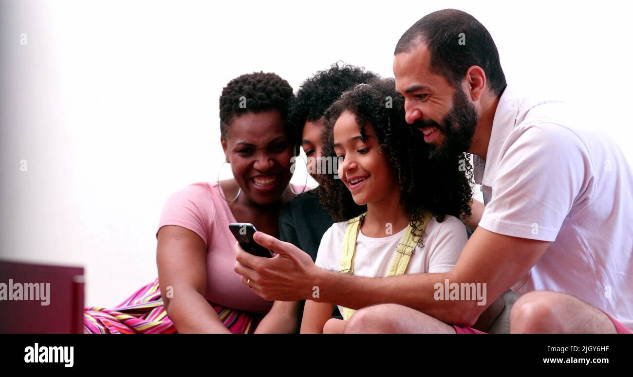 Children laugh dad smartphone hi-res stock photography and images - Alamy