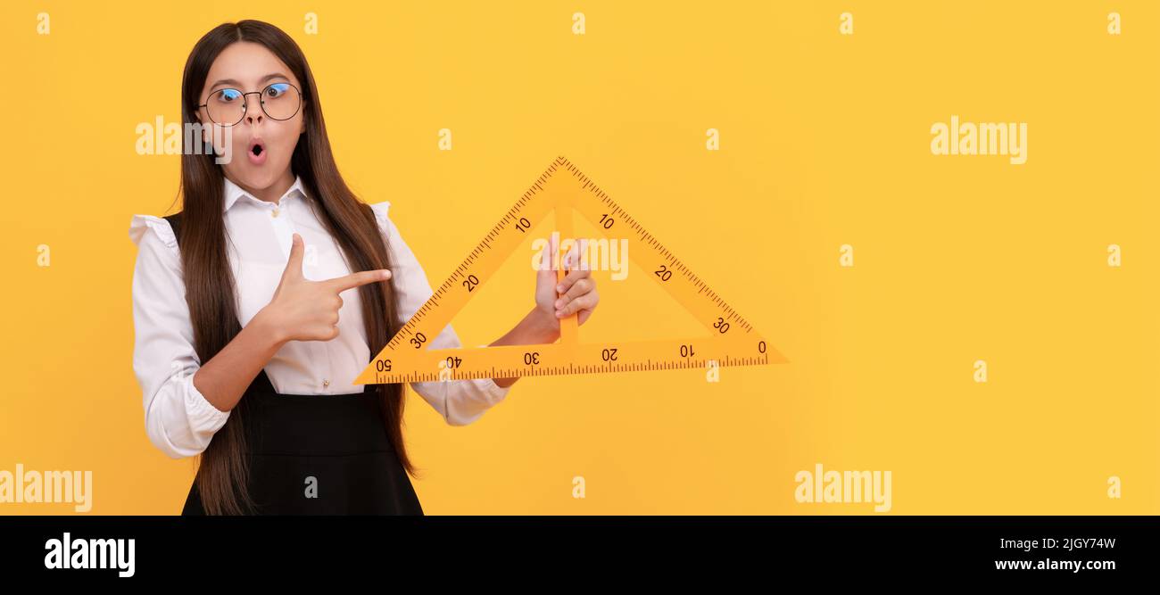 shocked kid in school uniform and glasses pointing finger mathematics ...