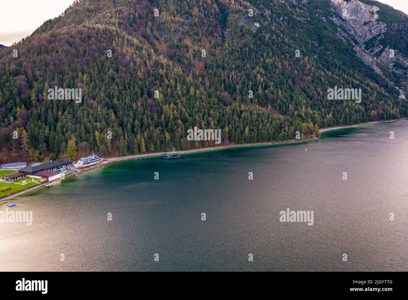 An aerial view of the Achen Lake with mountain in the background in ...