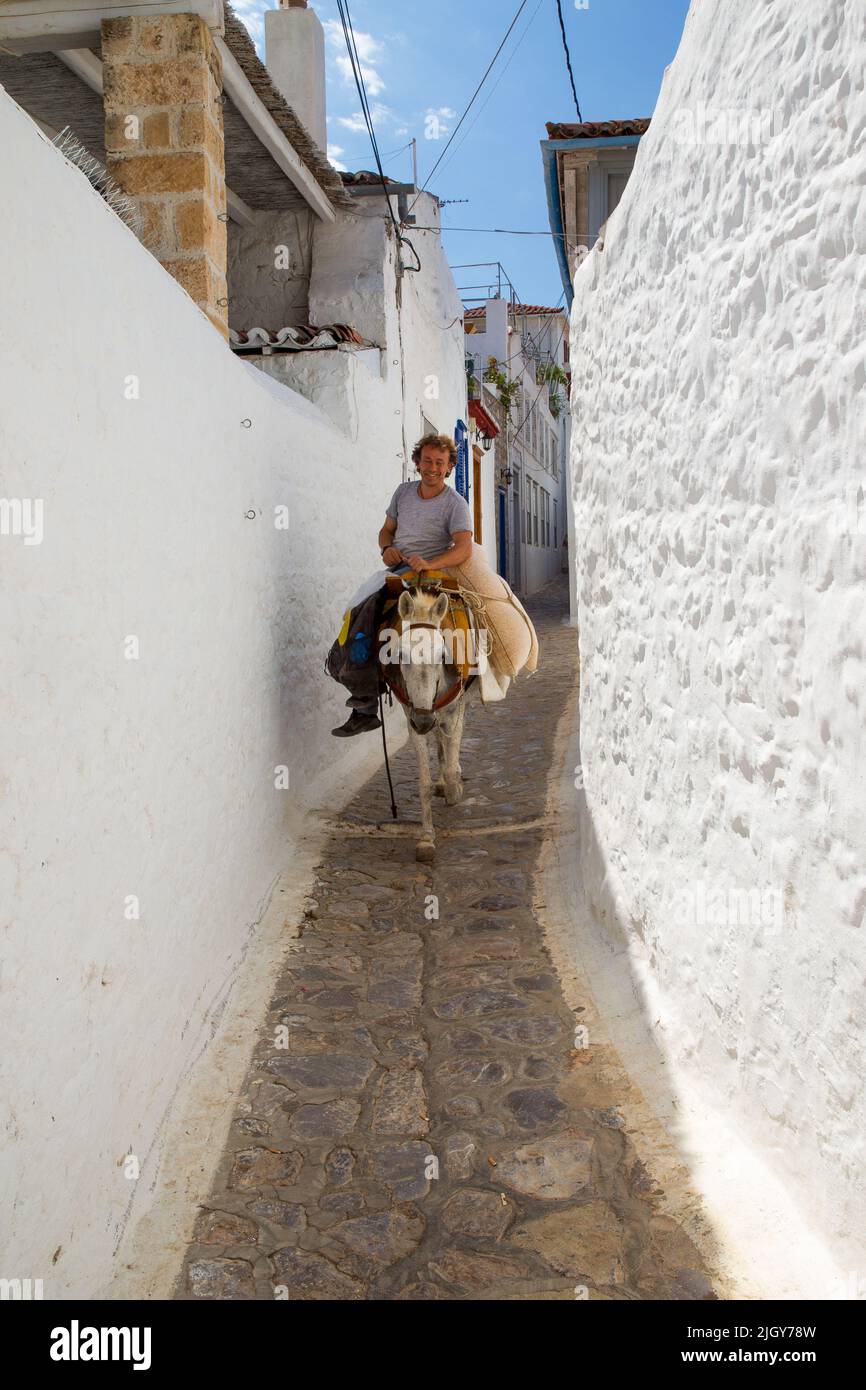 typical greek man on packed horse , Greek Island Hydra Stock Photo - Alamy