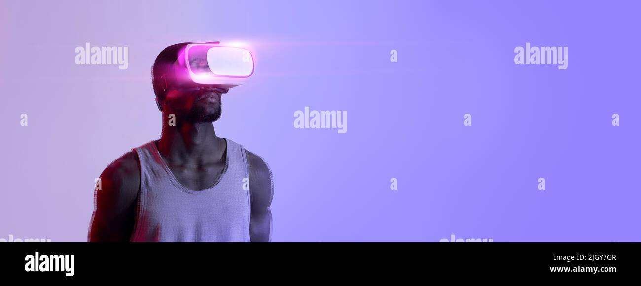 Fit guy wearing VR headset, exercising with virtual reality gear Stock ...