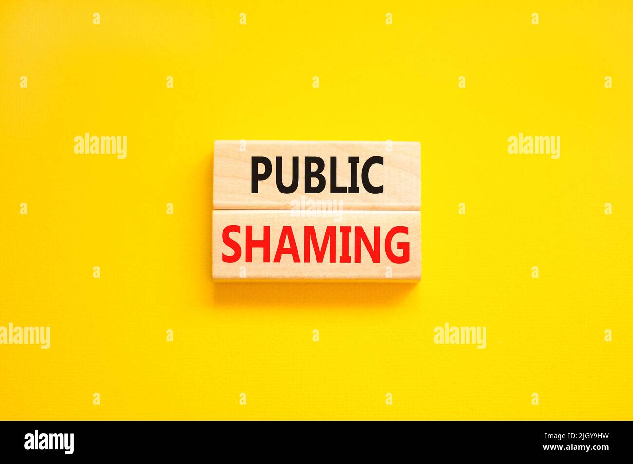 Public shaming symbol. Concept words Public shaming on wooden blocks on ...
